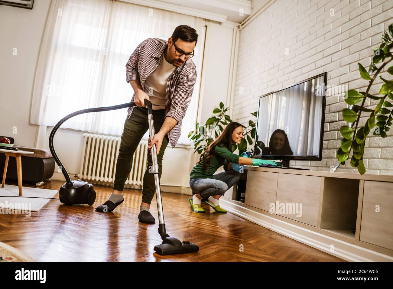 Cleaning together hi-res stock photography and images - Alamy