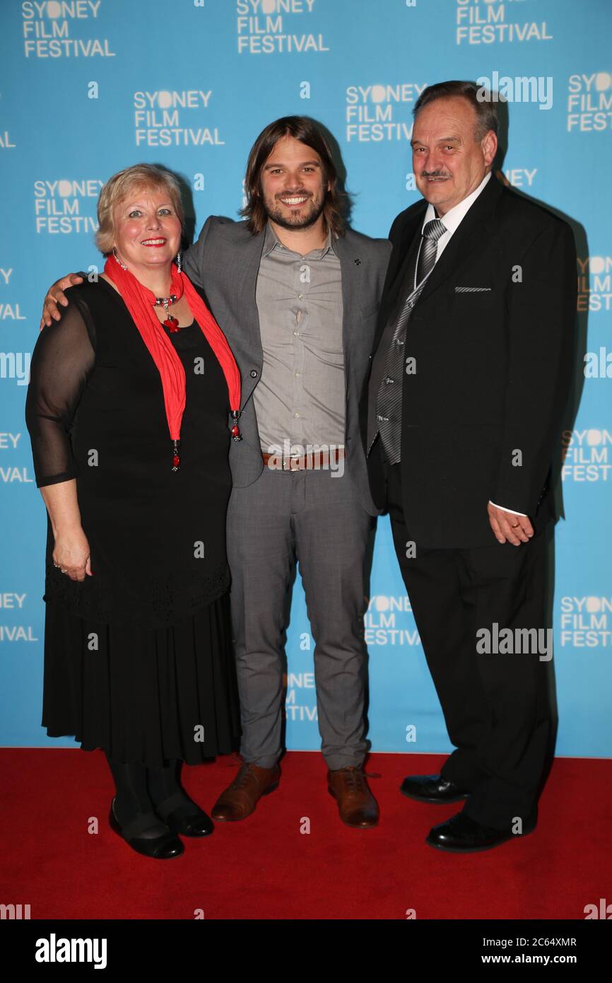 Director Alan Hicks (Al Hicks) and his parents arrive on the red carpet ...