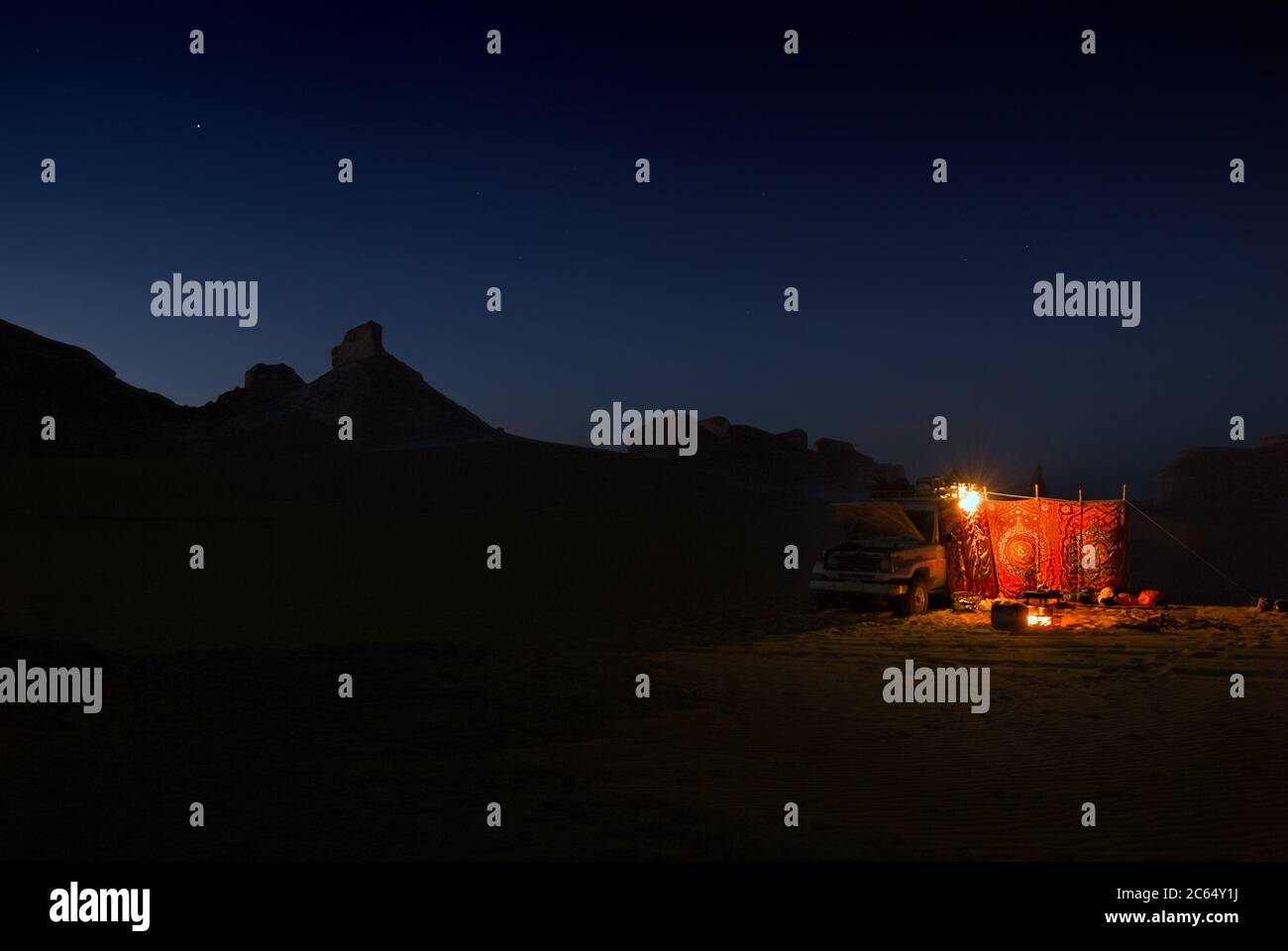 Sahara desert safari, off-road vehicle parking for overnight camp in ...
