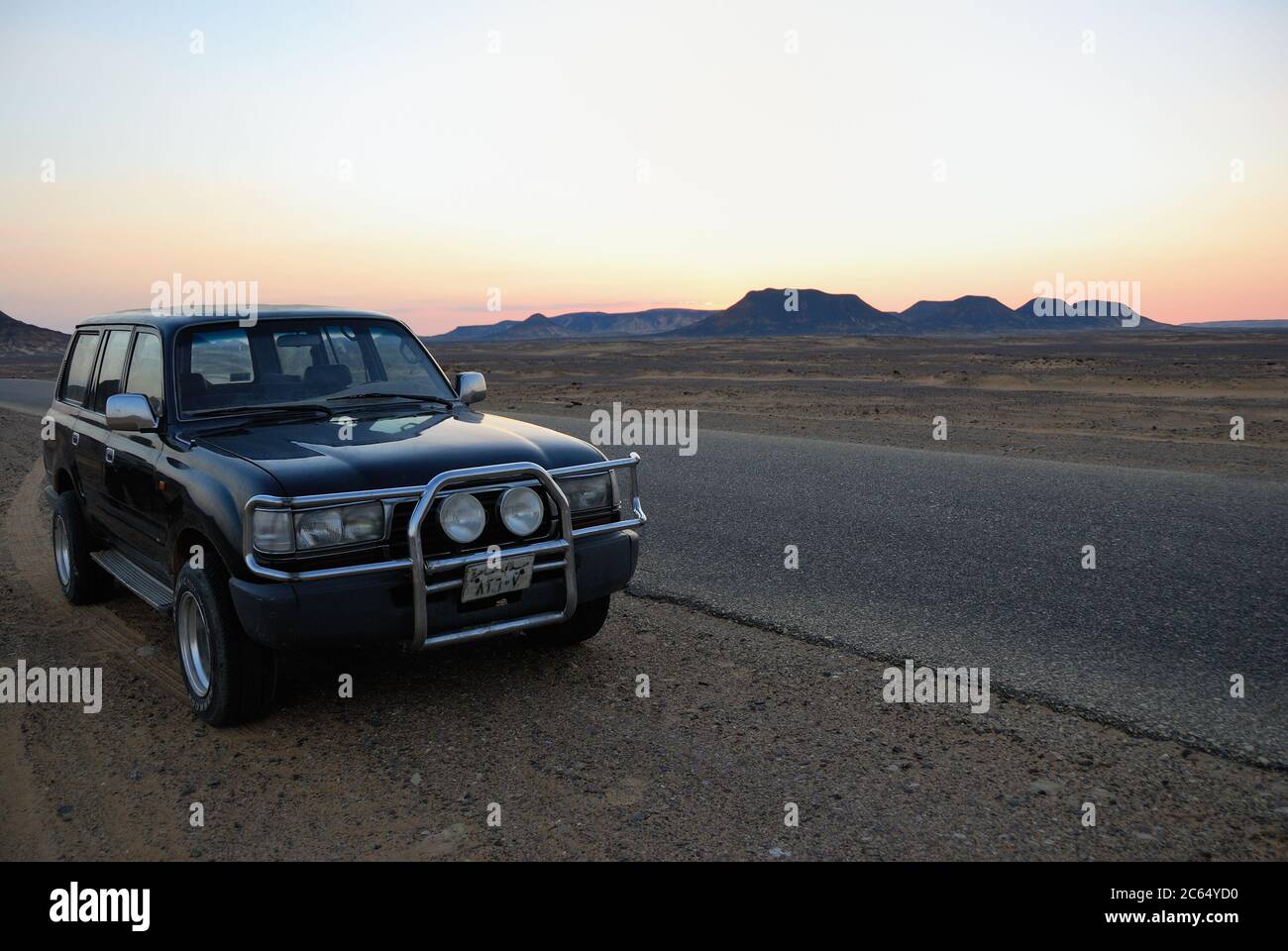 EGYPT, SAHARA - DEC 28, 2008: Off-road car shown in the Black desert at ...