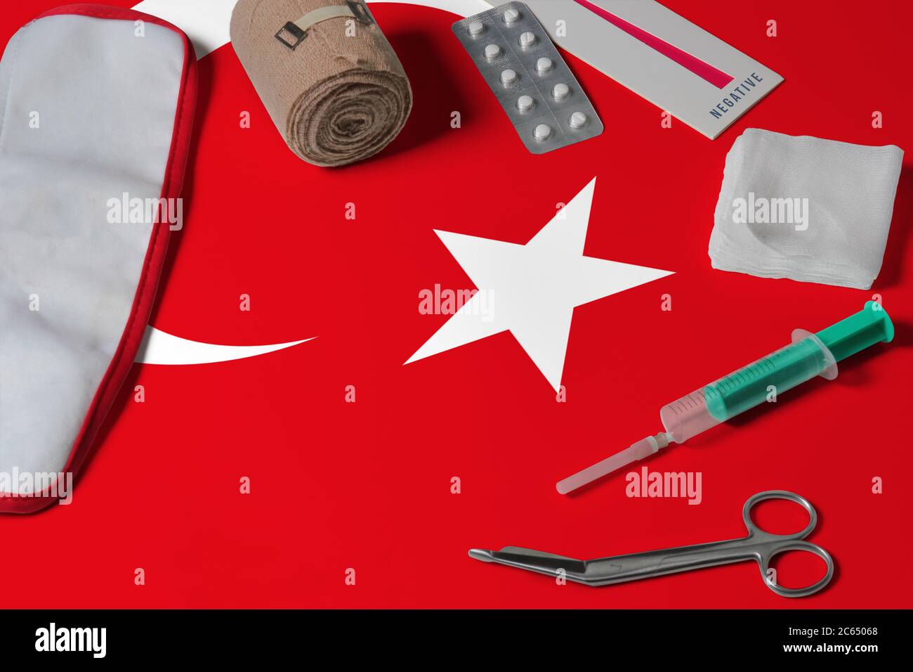 Turkey flag with first aid medical kit on wooden table background ...