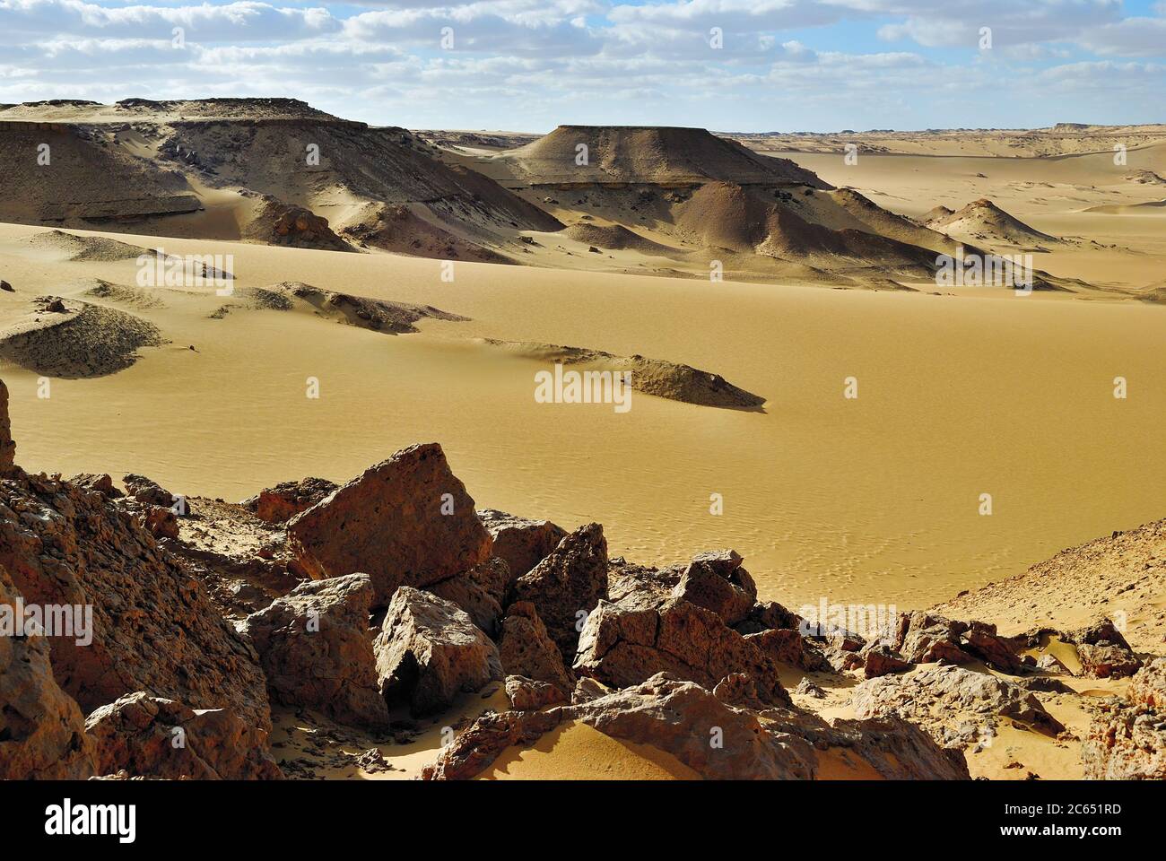 Western Desert landscape, rocks and sand dune at sunset time, Sahara ...