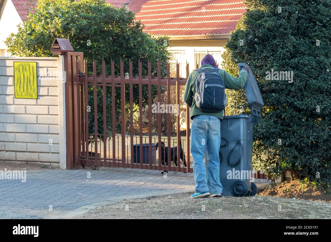 Alberton, South Africa - an identified black man dustbin diving on ...