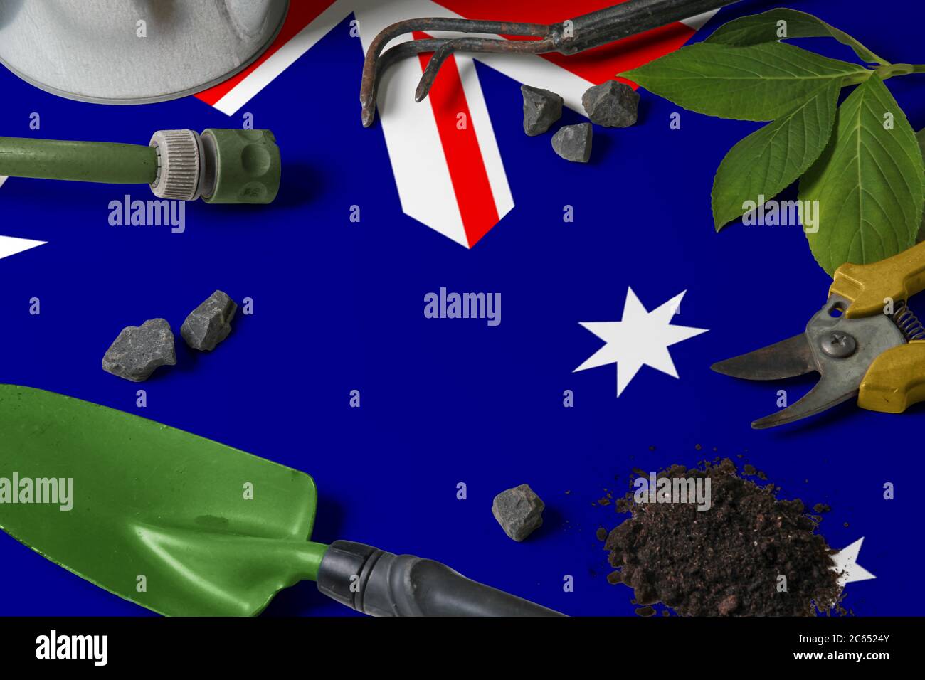 Australia flag with gardening tools background on table. Spring in the ...