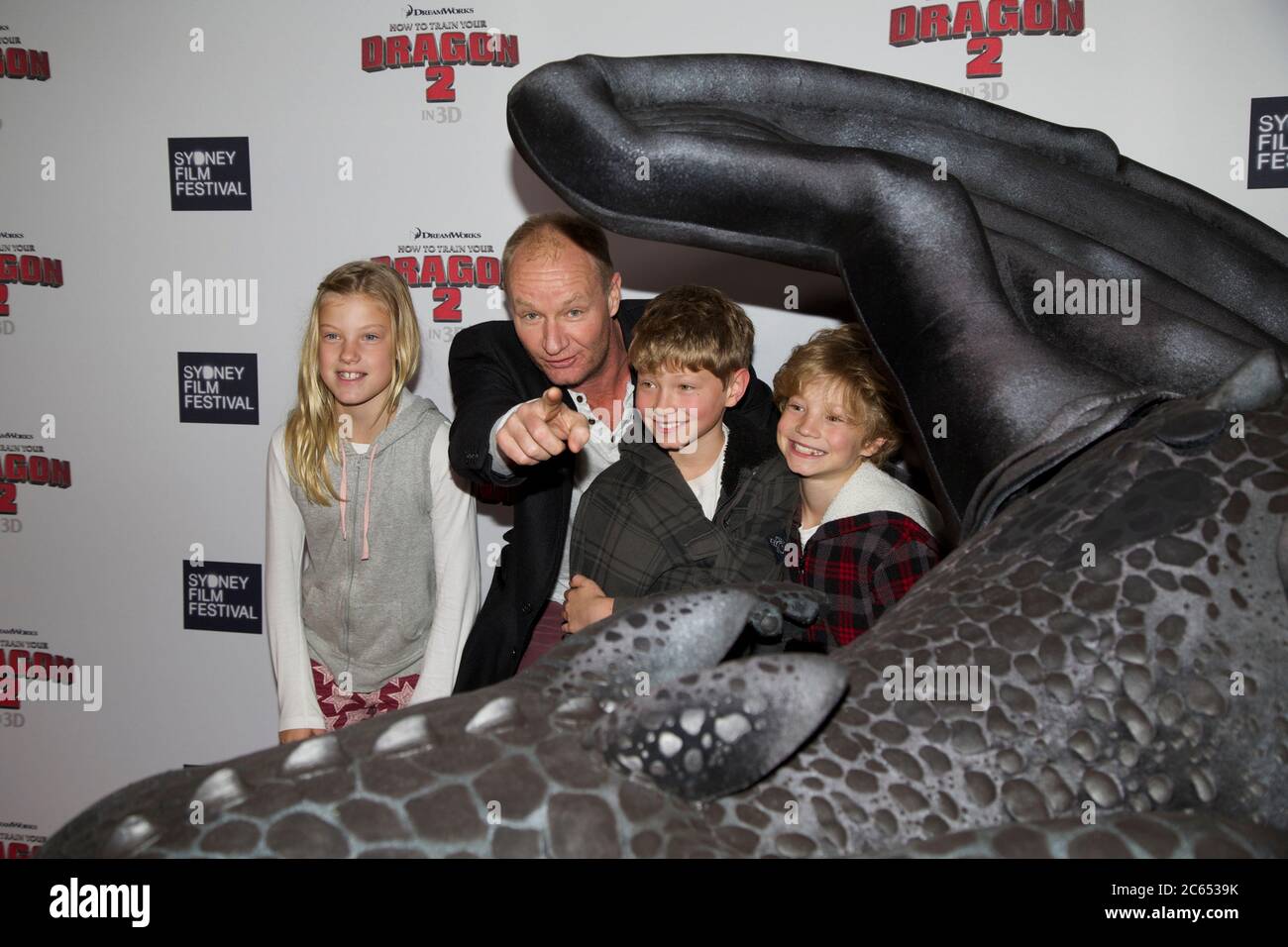 Rob Carlton arrives on the red carpet pictured with Toothless the ...
