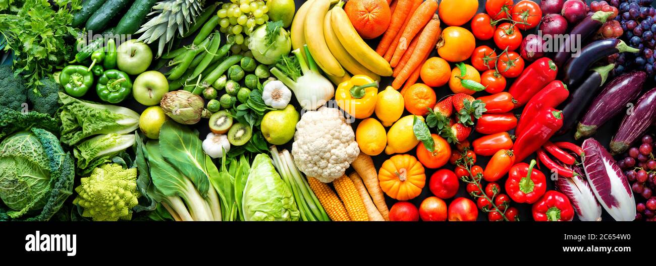 Panoramic food background with assortment of fresh organic fruits and ...