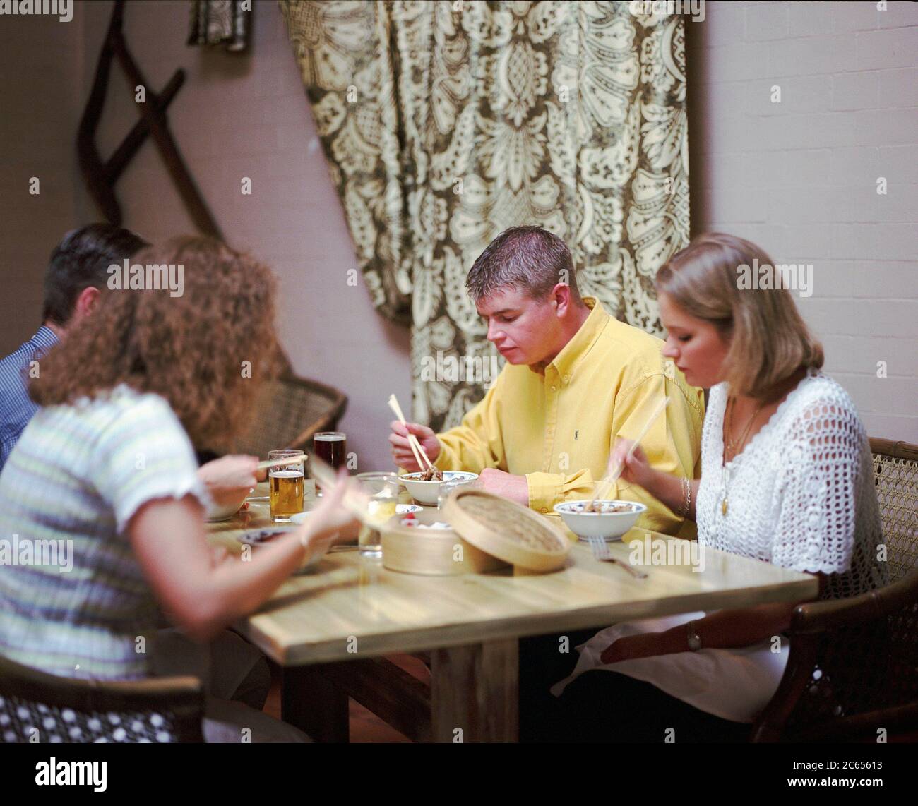 Diners eating at eastern style bar hi-res stock photography and images ...