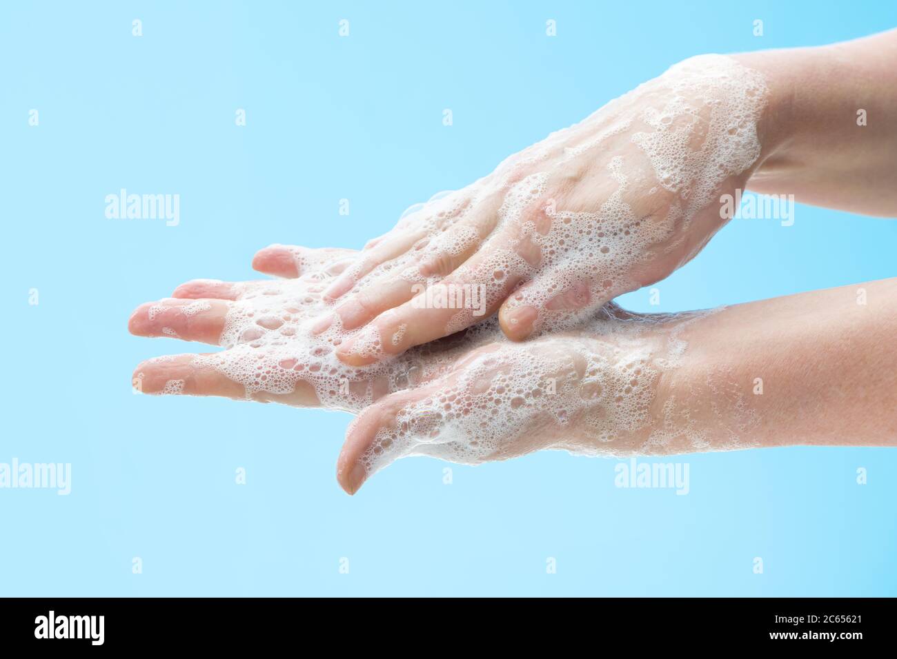 Washing hands with soap to prevent germs, bacteria or viruses. Cleaning ...