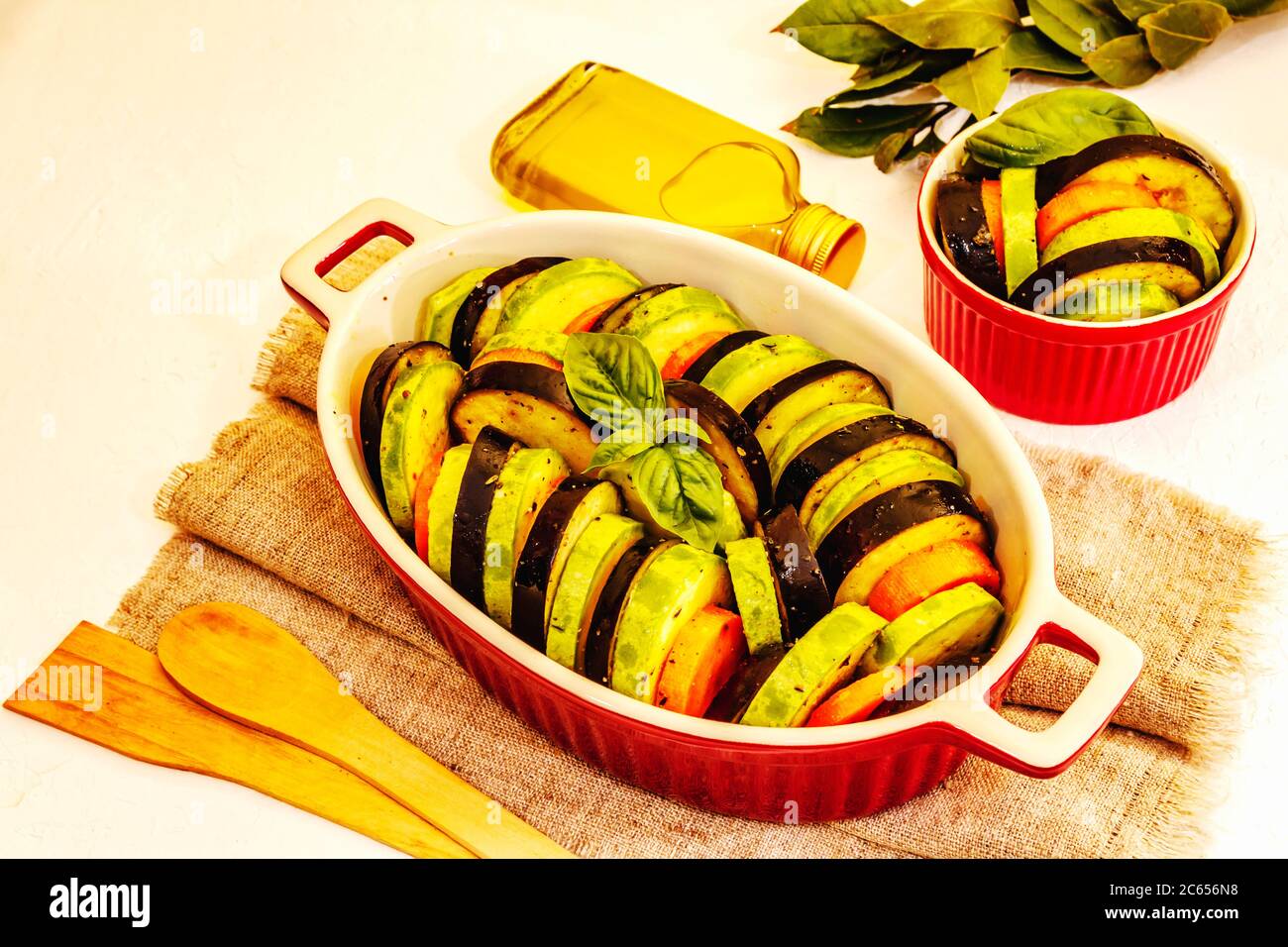 Fresh vegetables for baking. Olive oil, eggplant, zucchini, carrot ...