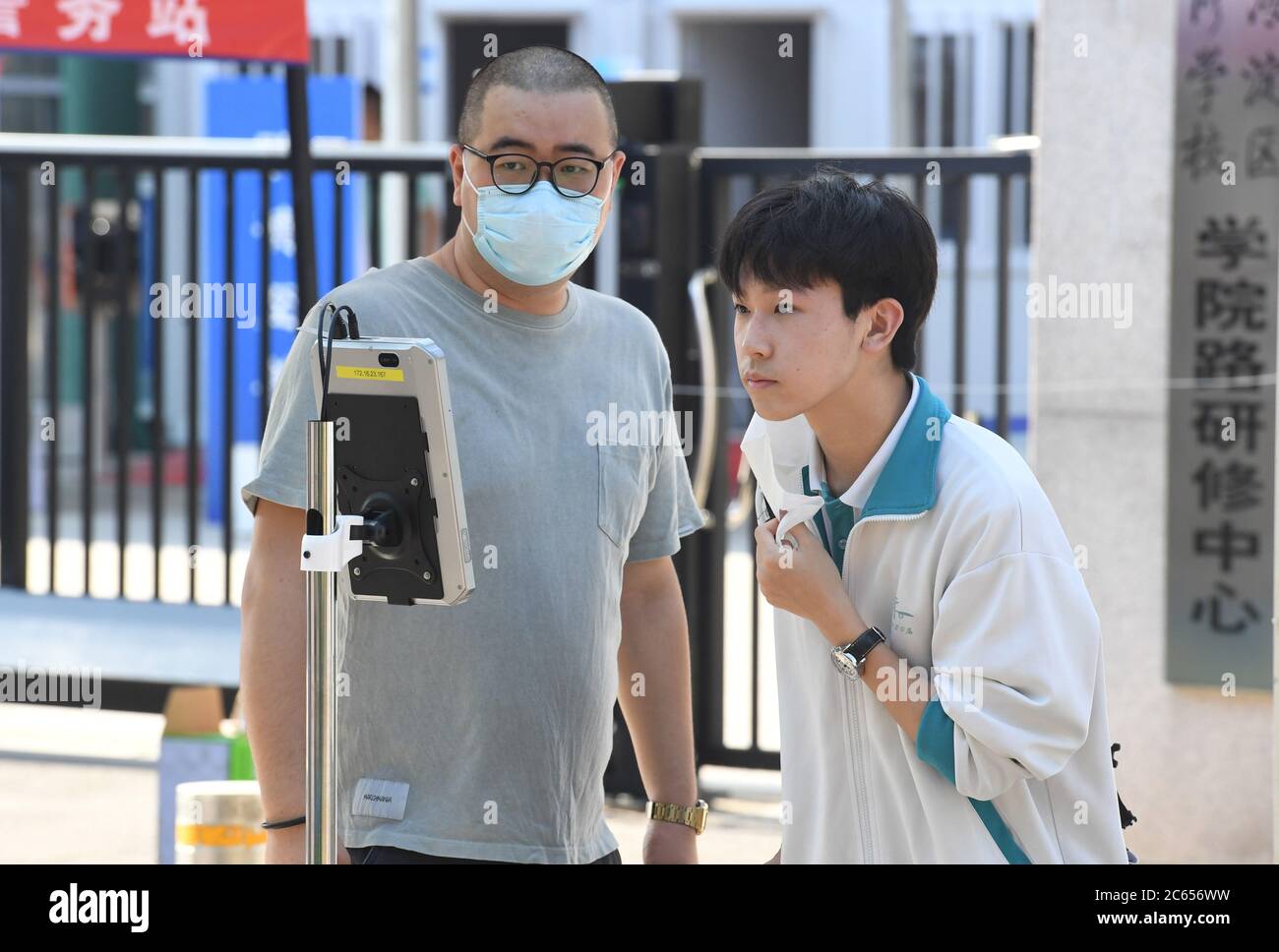 Beijing, China. 7th July, 2020. An examinee receives face-scanning ...