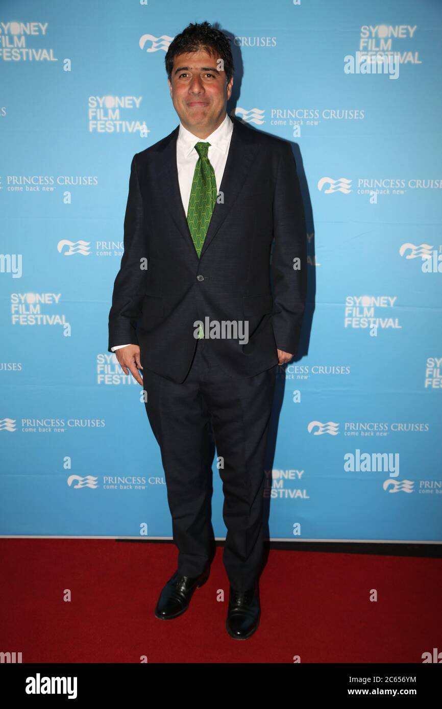 Director Hossein Amini arrives on the red carpet at the Australian ...