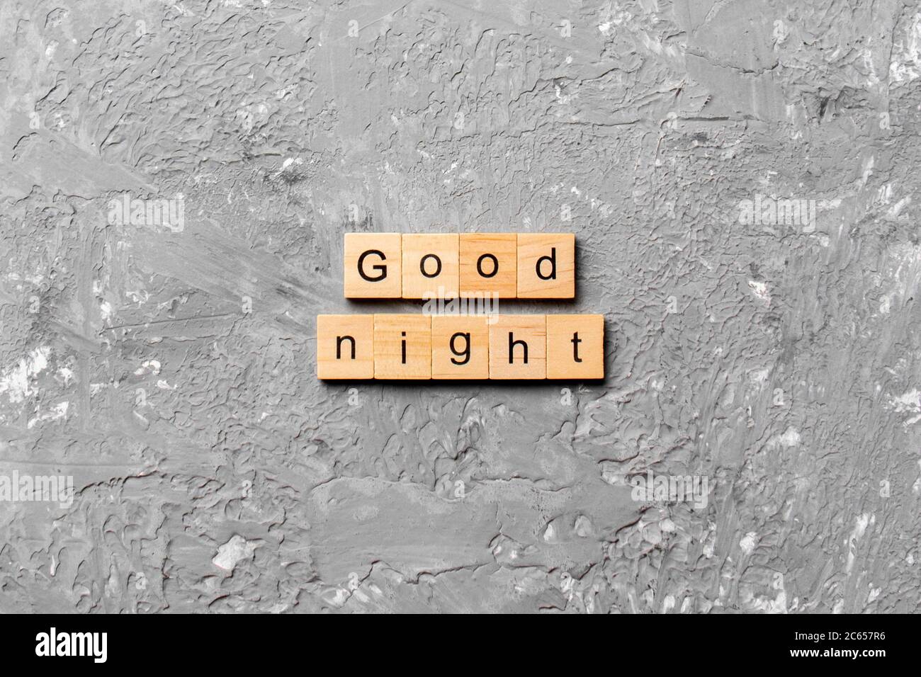 good night word written on wood block. good night text on table ...