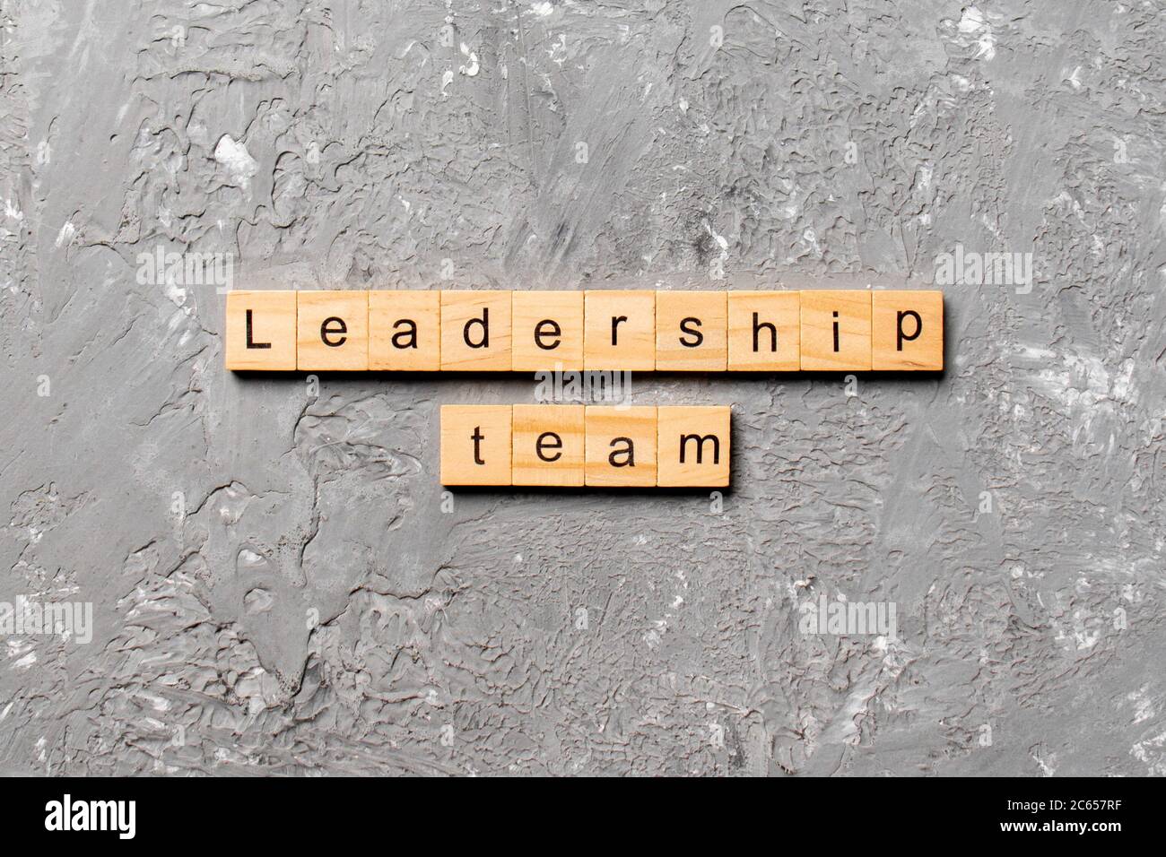 leadership team word written on wood block. leadership team text on ...