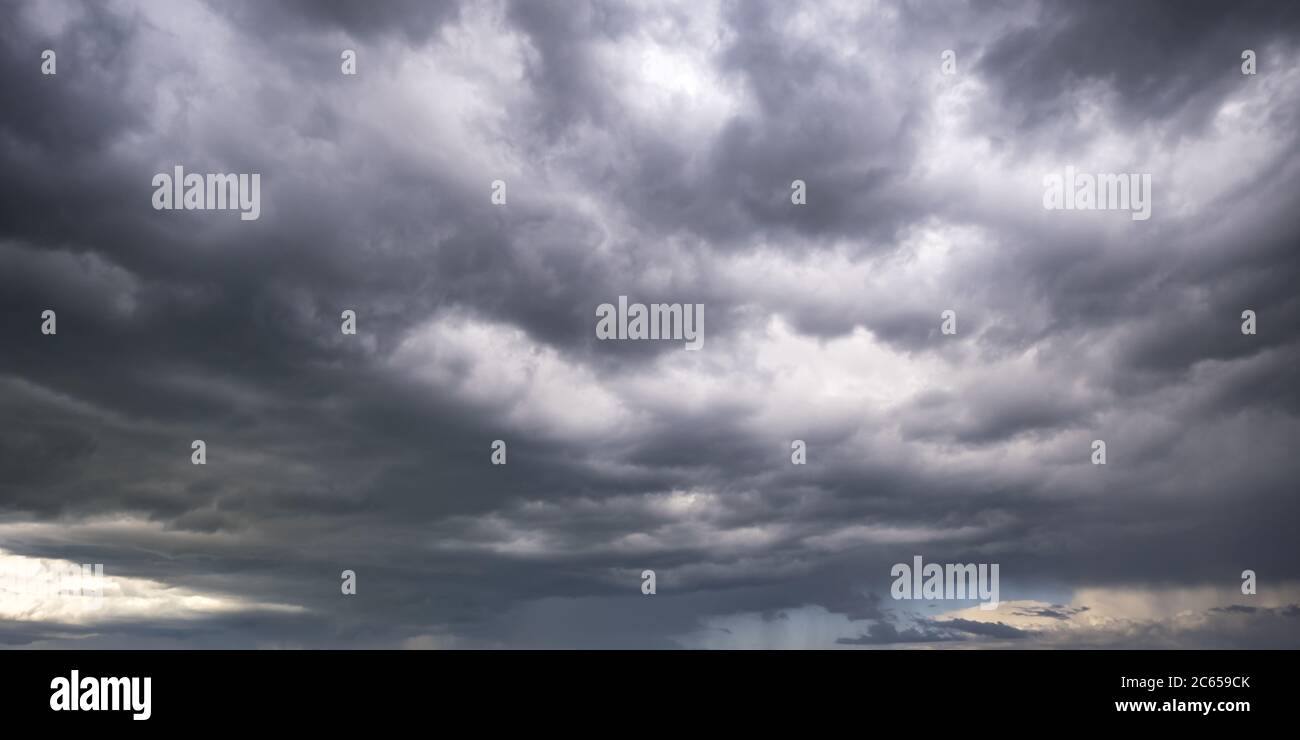 panorama of black sky background with storm clouds. thunder front Stock ...