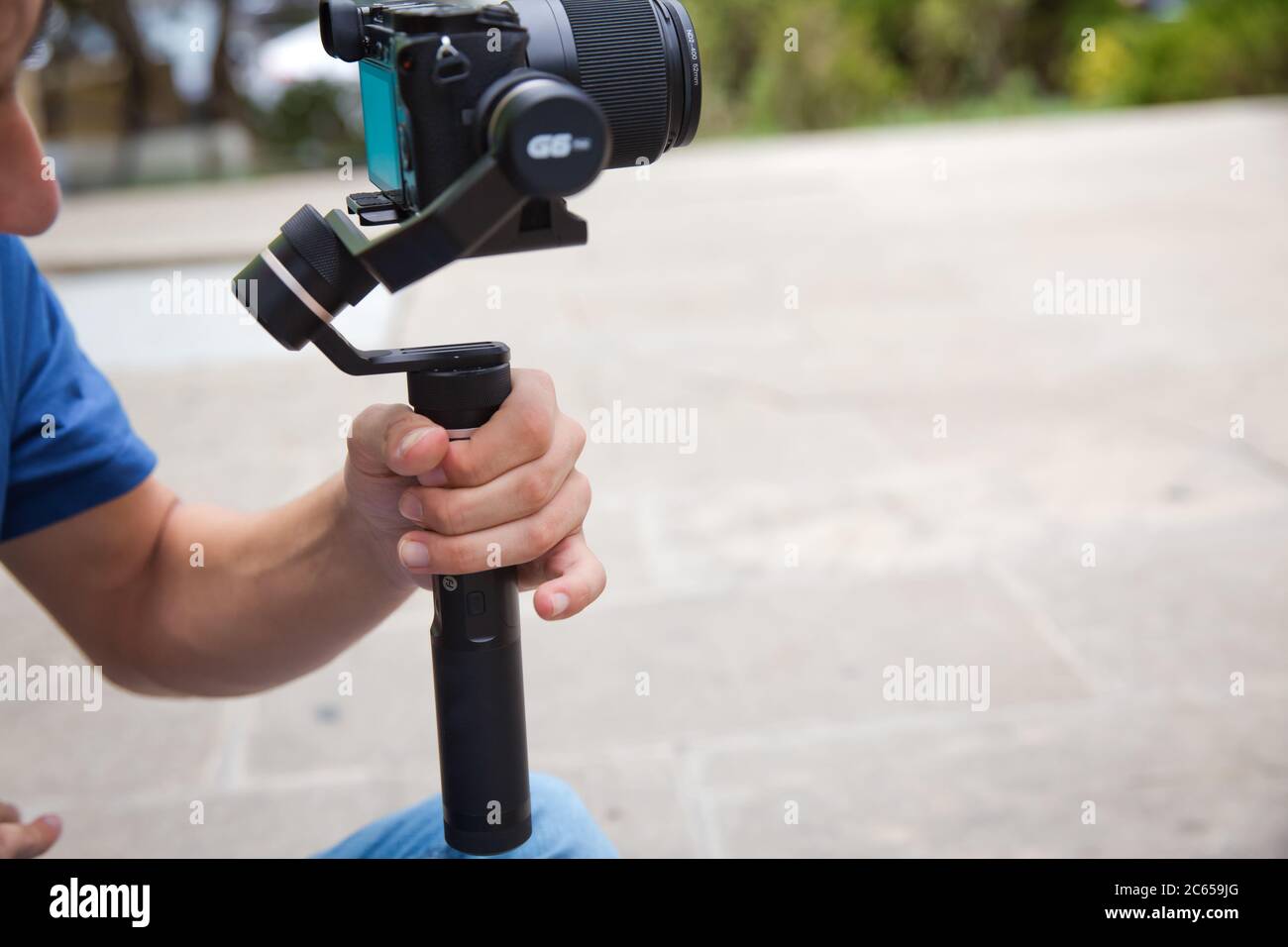 Gimbal Operator with black equipament - Stabilizer and camera ...
