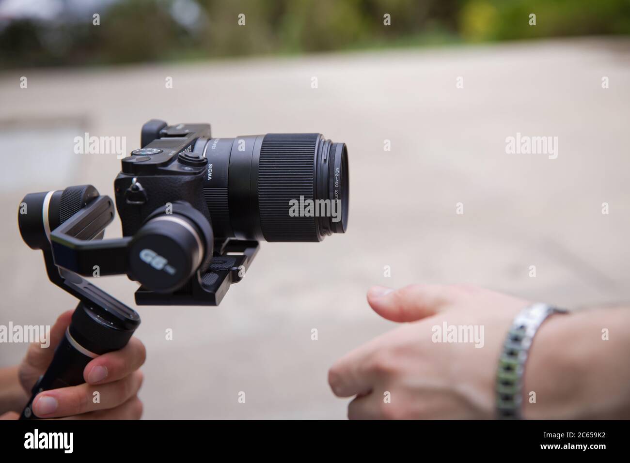 Gimbal Operator with black equipament - Stabilizer and camera ...