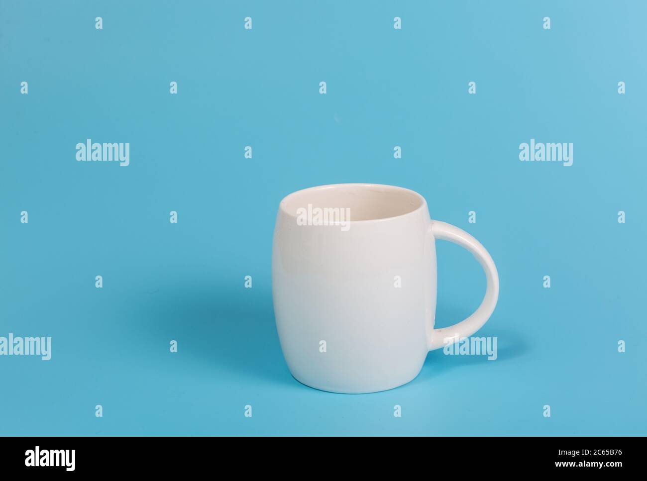 Blue shades and white cups Stock Photo - Alamy