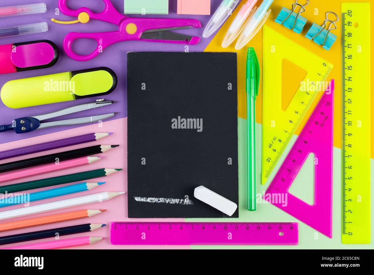 Back to school with stationary and chalk board on colorful paper ...