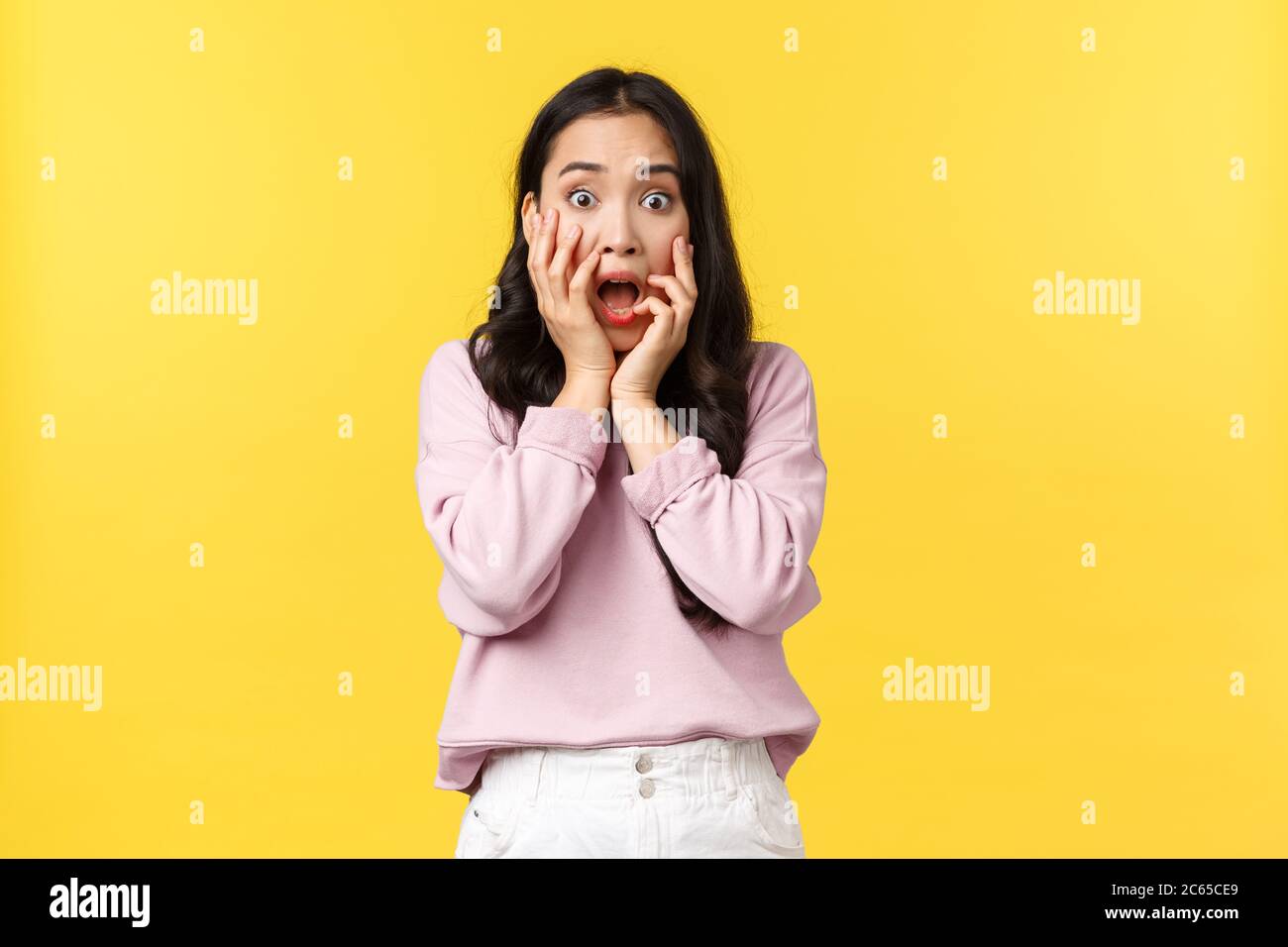 Lifestyle, emotions and advertisement concept. Shocked and scared asian ...