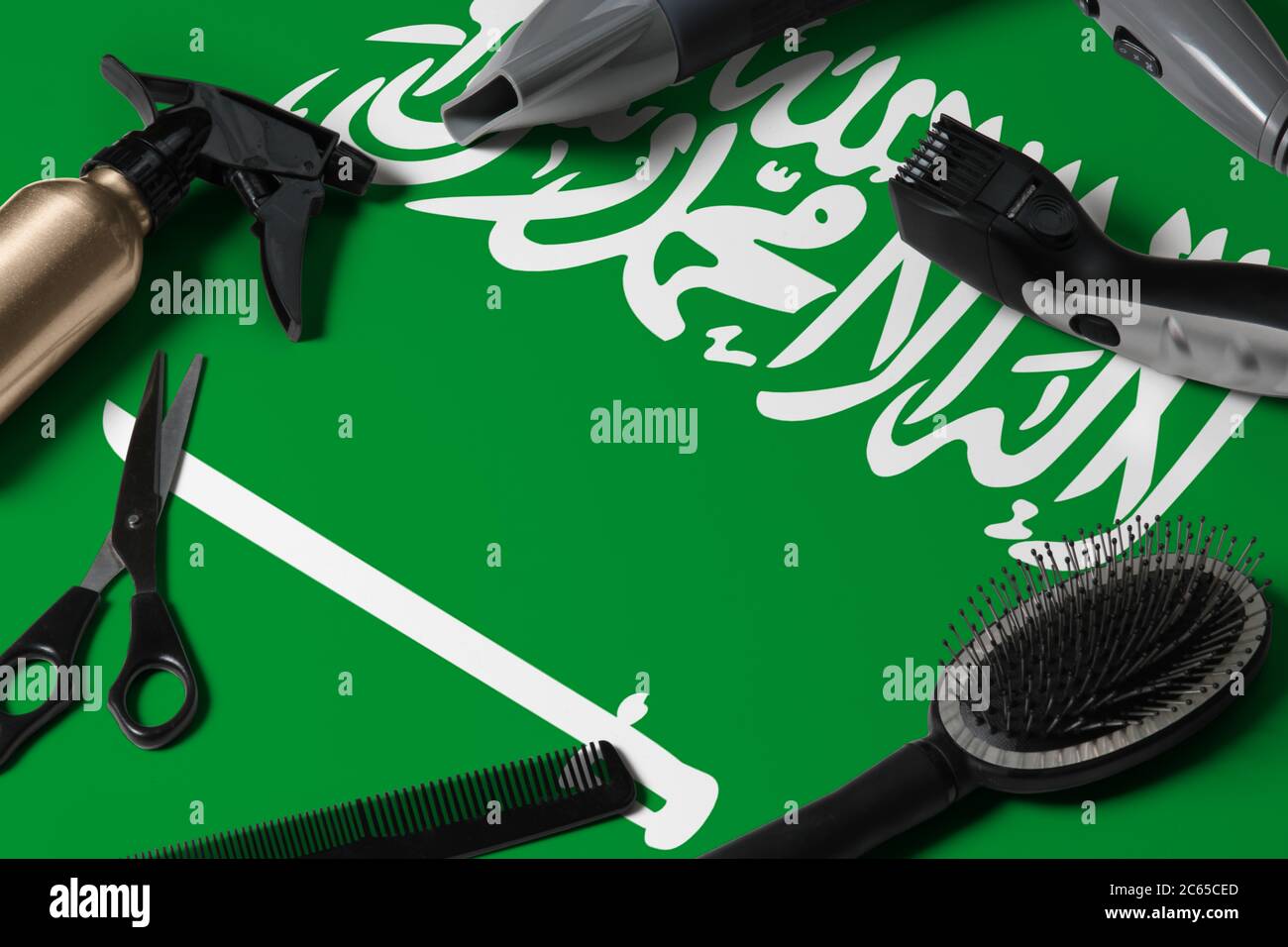 Saudi Arabia flag with hair cutting tools. Combs, scissors and ...