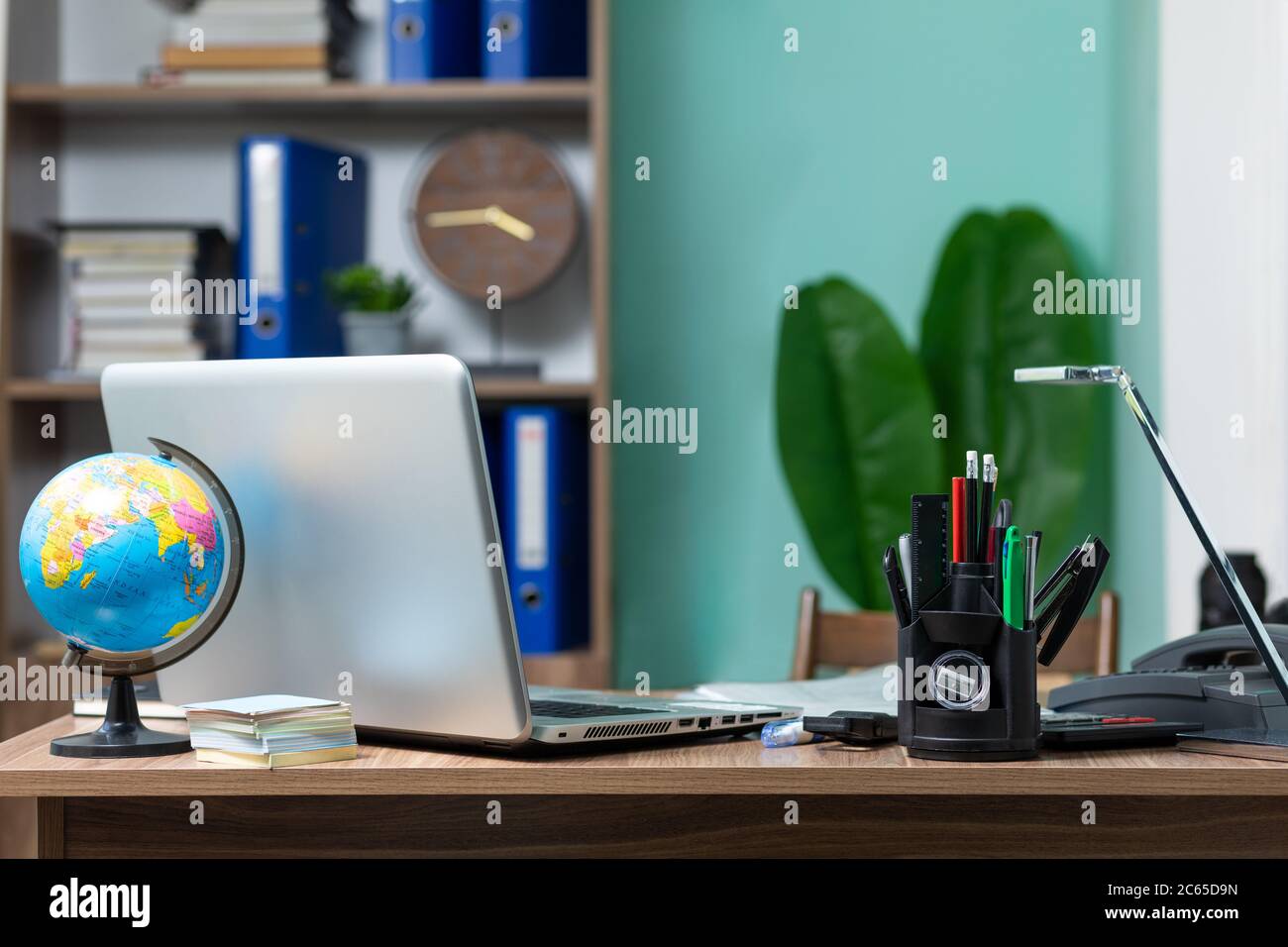 Modern office desk desk view Stock Photo - Alamy