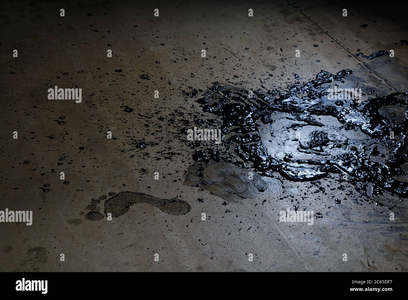 Human's footprint near the black mucky puddle Stock Photo - Alamy