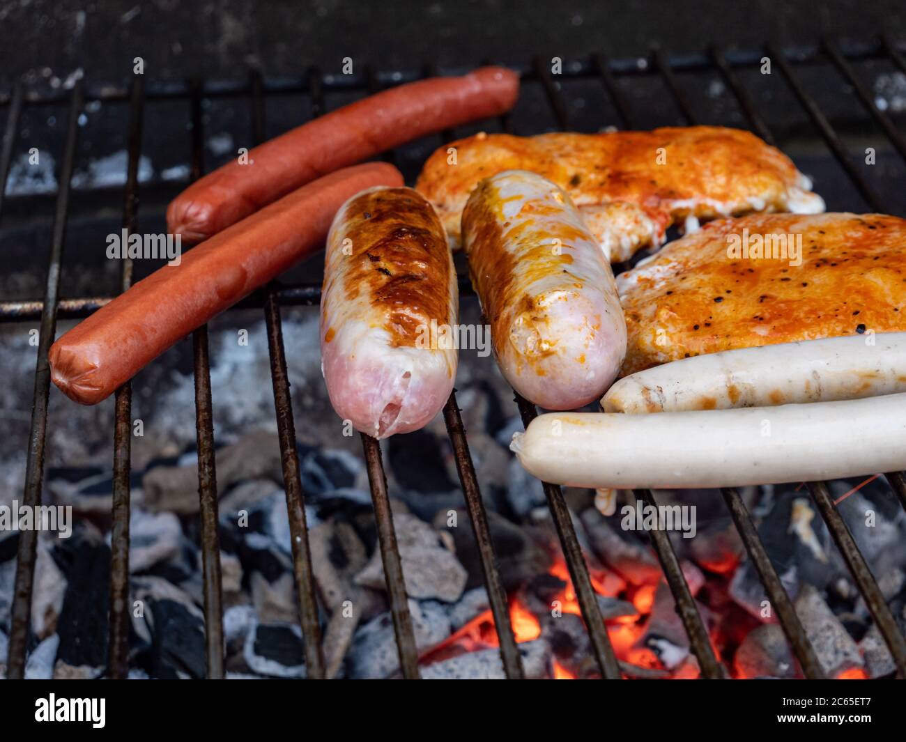 Barbecue range on the charcoal grill in the garden Stock Photo - Alamy