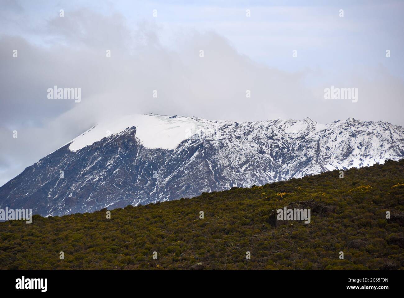 Clouds covered Kibo peak on Mount Kilimanjaro at sunrise, Tanzania ...