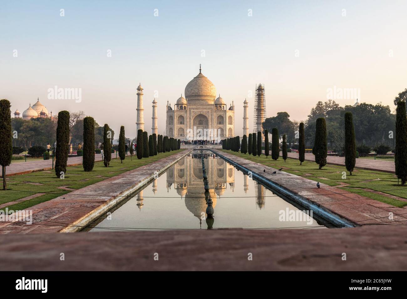 View of Taj Mahal with pool reflection in Agra India at sunrise Stock ...