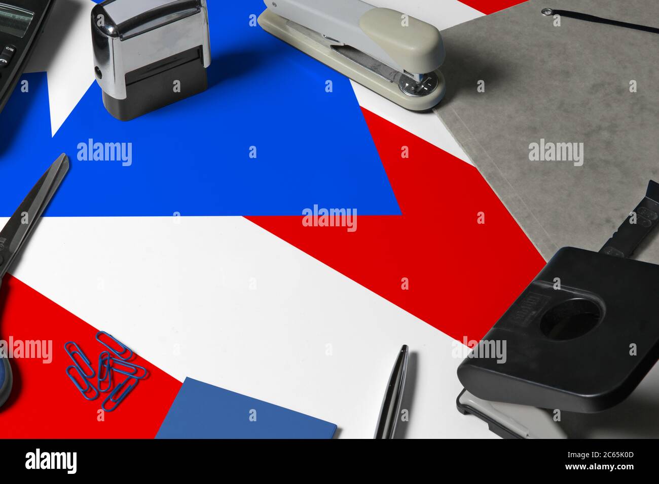 Puerto Rico flag with office clerk workplace background. National ...