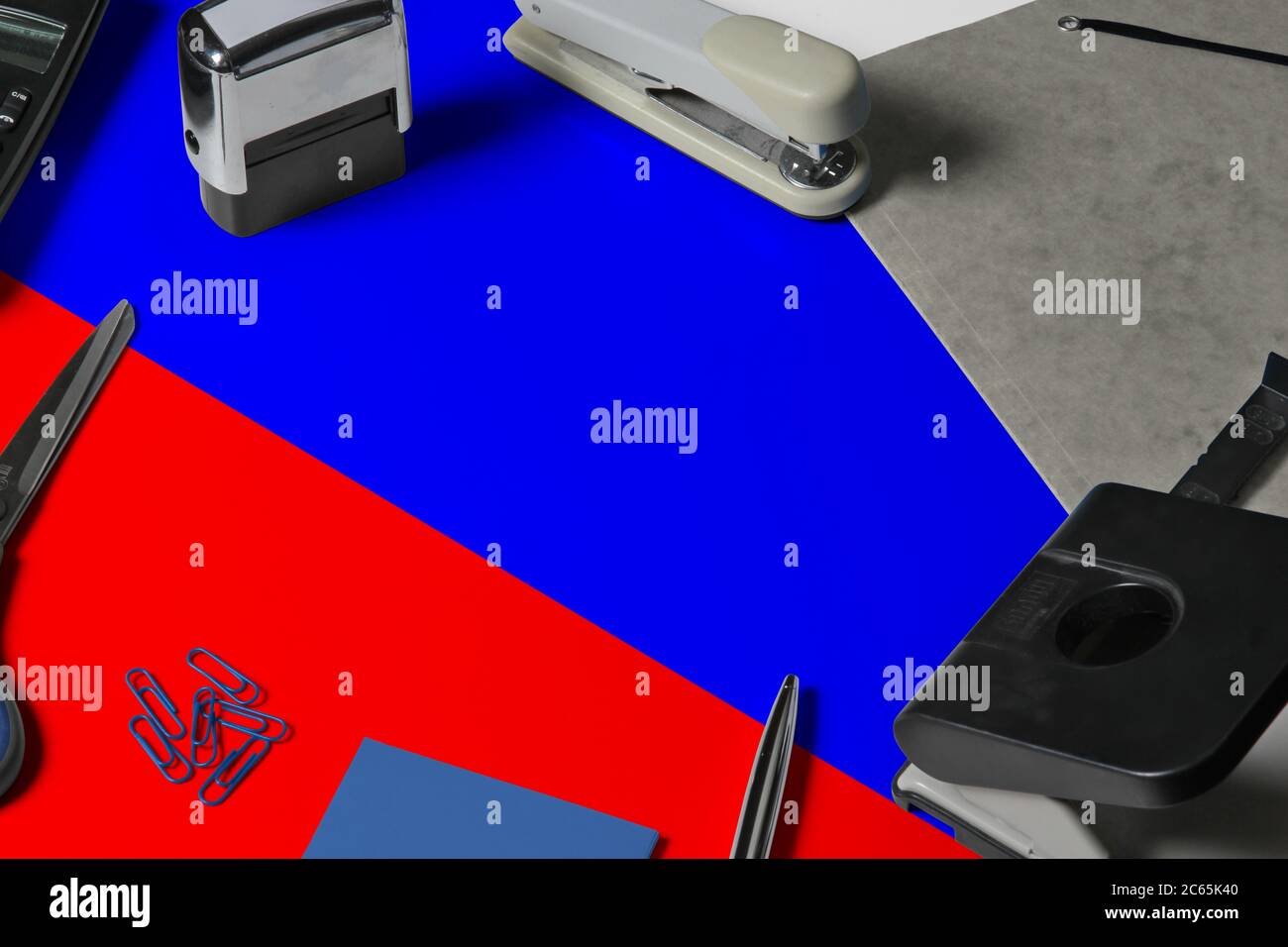 Russia flag with office clerk workplace background. National stationary ...
