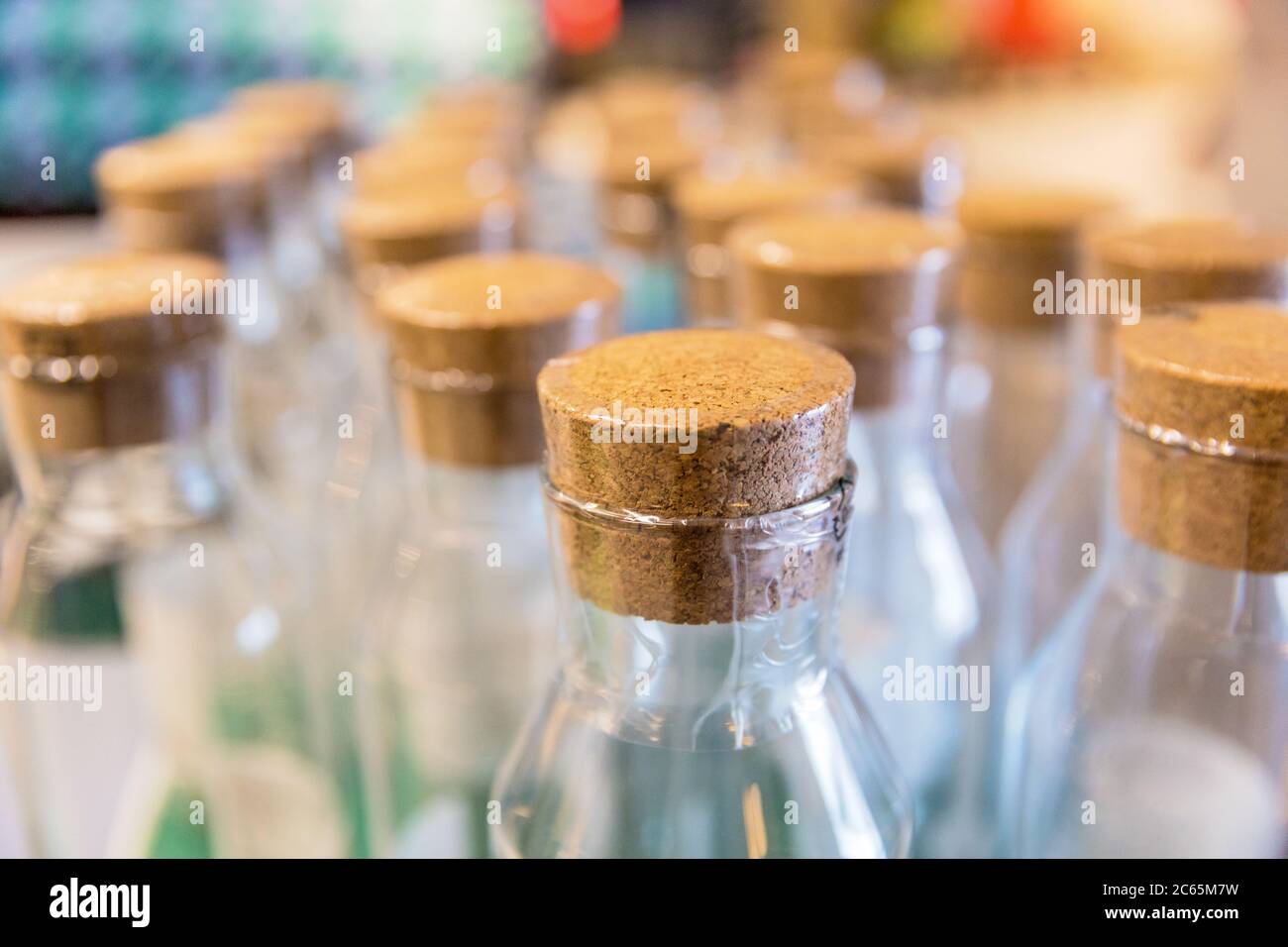 Well-arranged glass jars closed with oak stoppers Stock Photo - Alamy