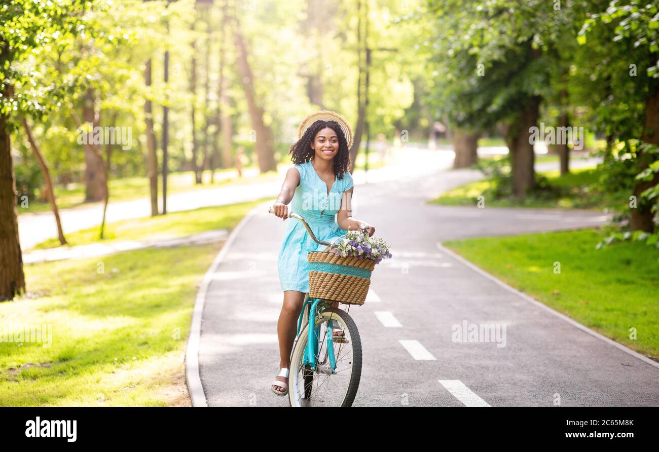 Black woman riding bike High Resolution Stock Photography and Images ...