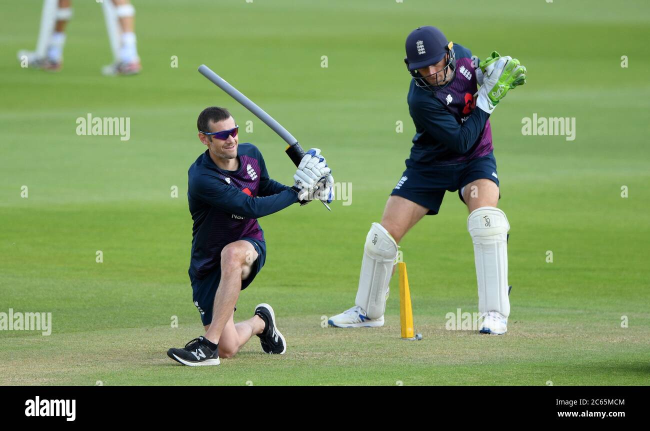 England wicketkeeper Jos Buttler takes part in a drill with coach Chris ...