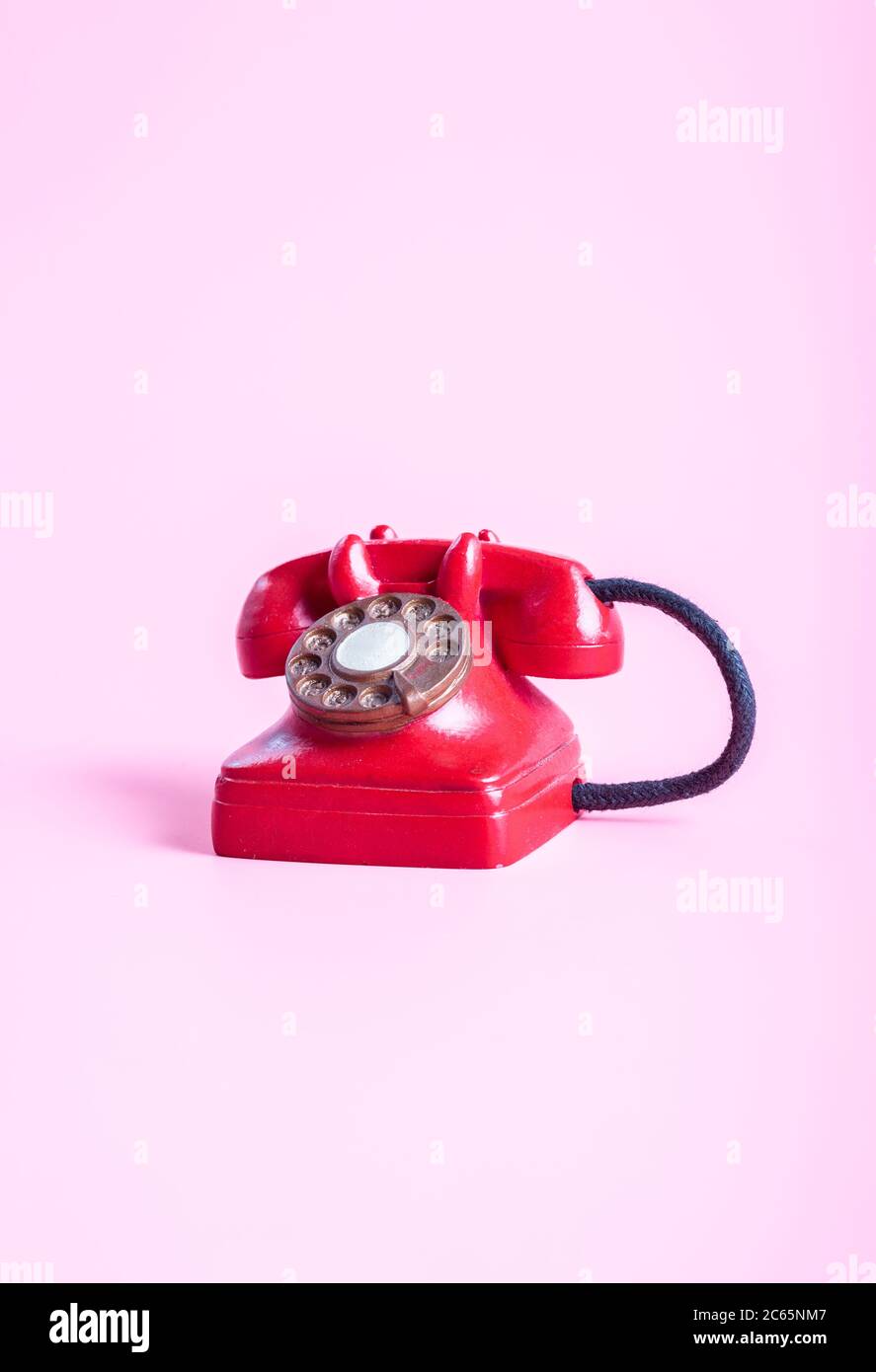 Pink telephone receiver on pink hi-res stock photography and images - Alamy