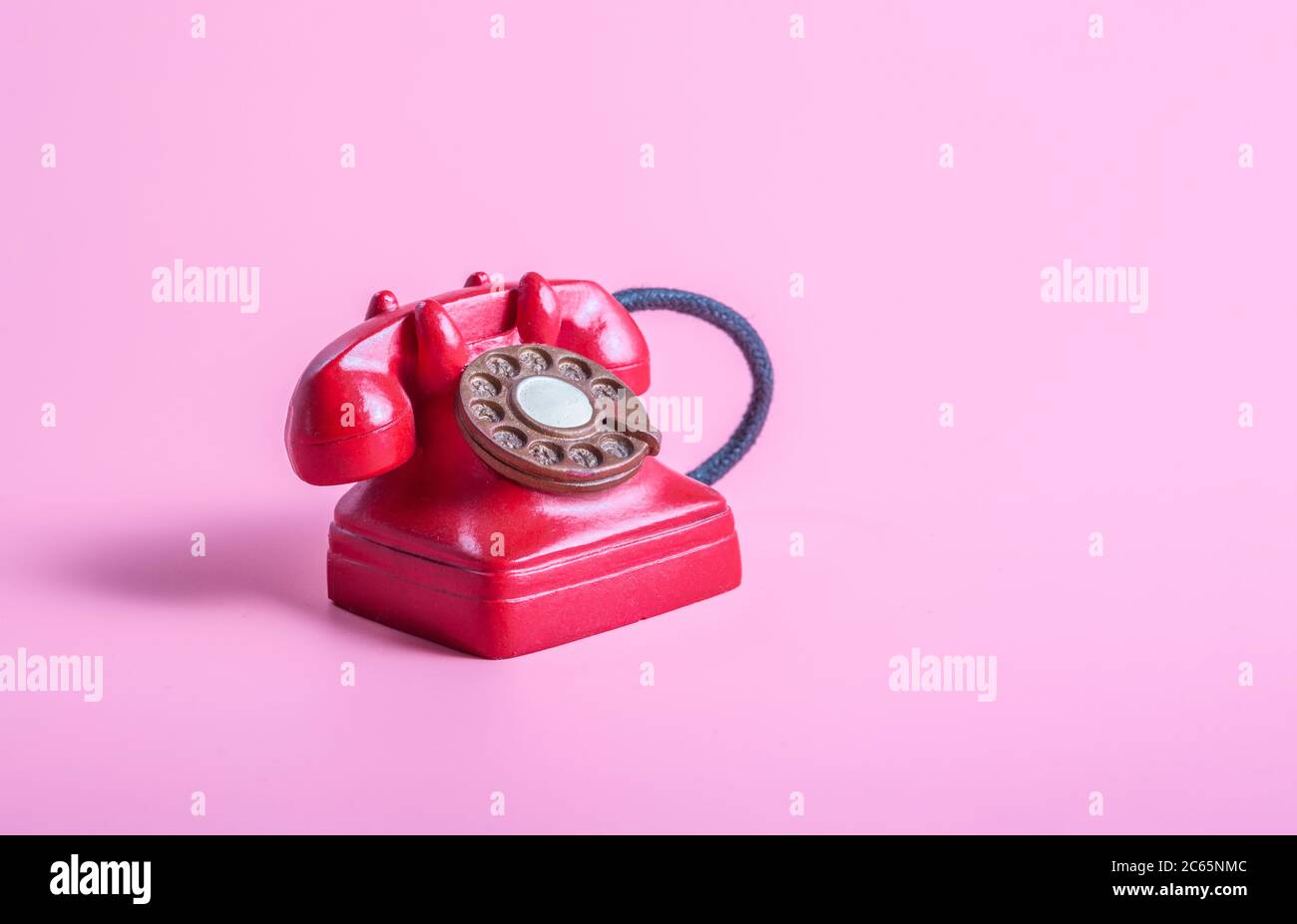 Pink telephone receiver on pink hi-res stock photography and images - Alamy