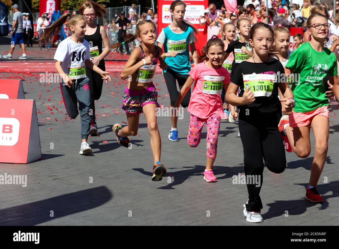 ODESSA, UKRAINE - CIRCA SEPTEMBER, 2019: Kids running half-marathon in ...
