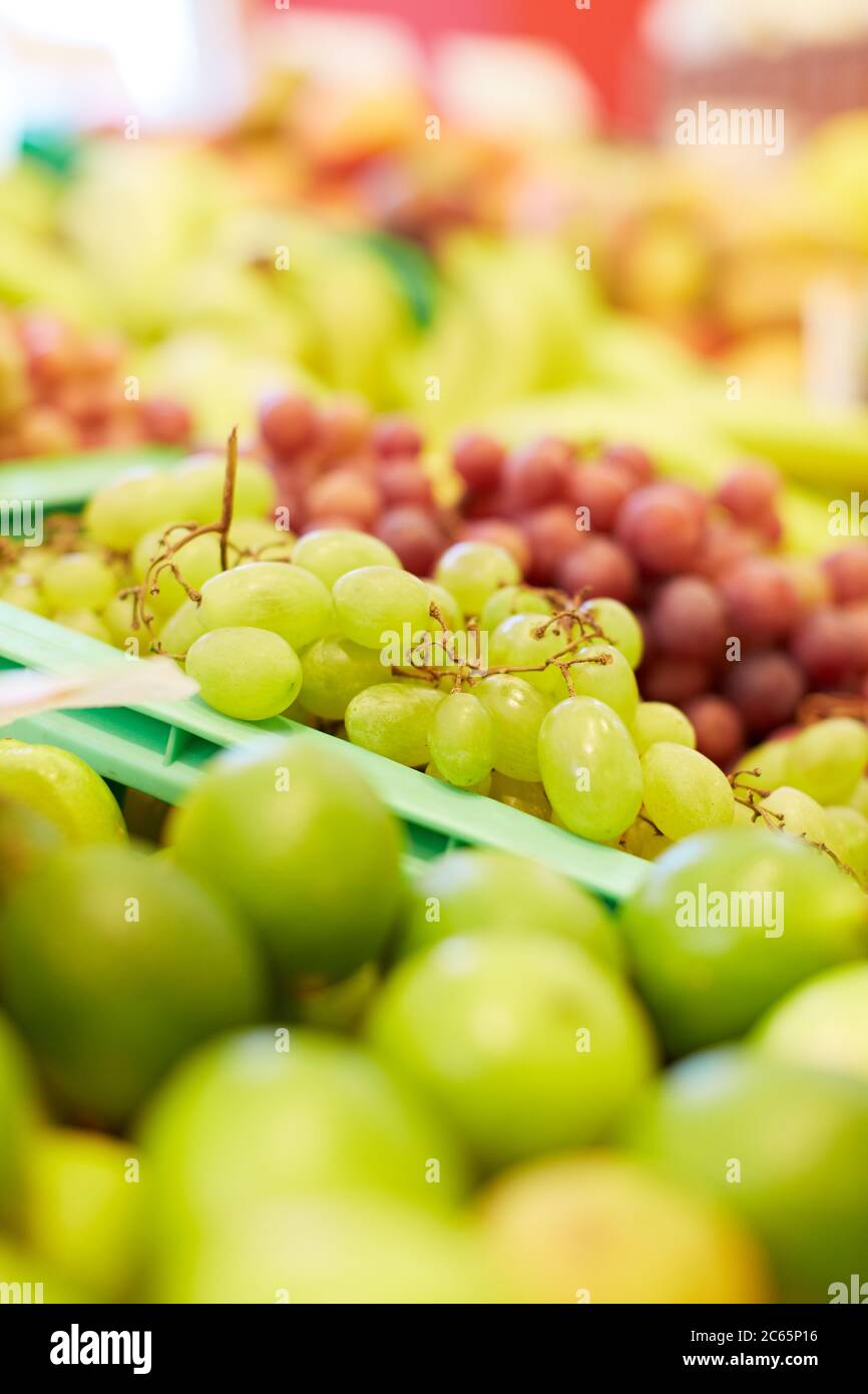 Various fresh grapes are on sale in the supermarket Stock Photo - Alamy