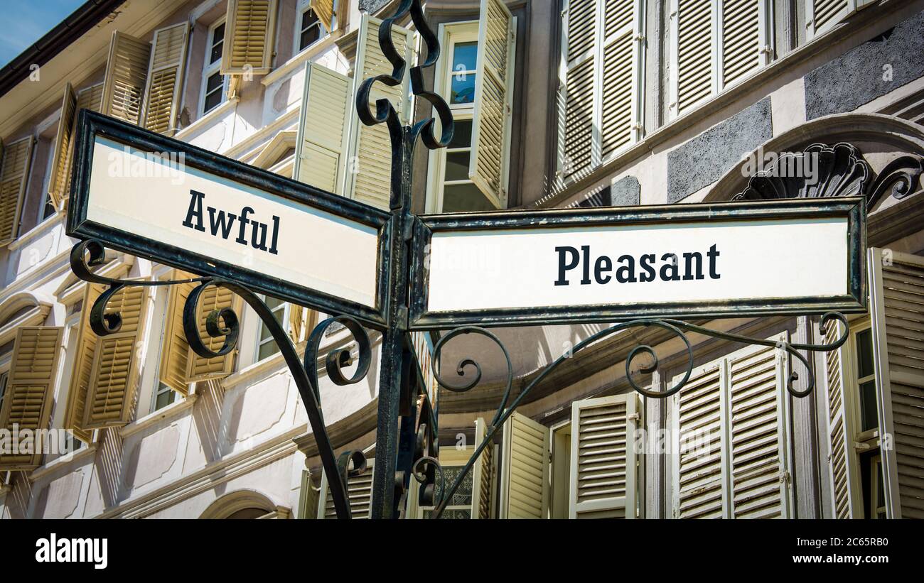 Street Sign the Direction Way to Pleasant versus Awful Stock Photo - Alamy