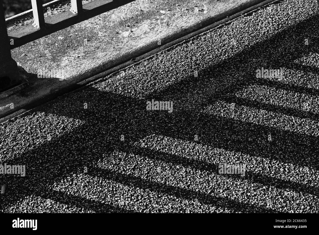 Shadow from a railing Stock Photo - Alamy