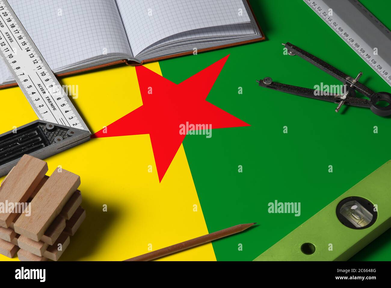 French Guiana national flag on profession concept with architect desk ...