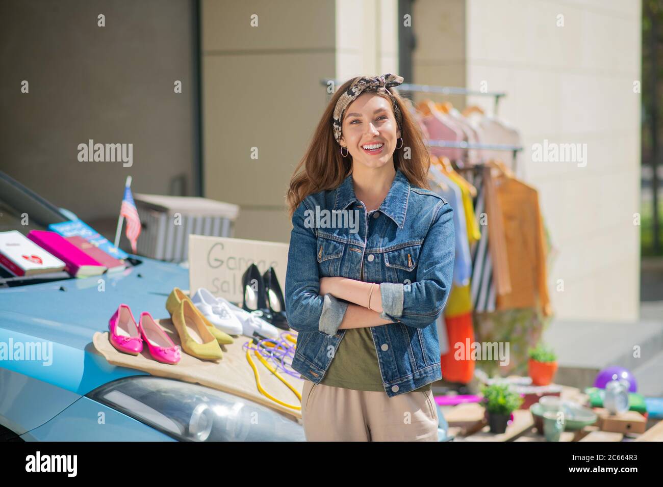 Smiling positive woman seller hi-res stock photography and images - Alamy