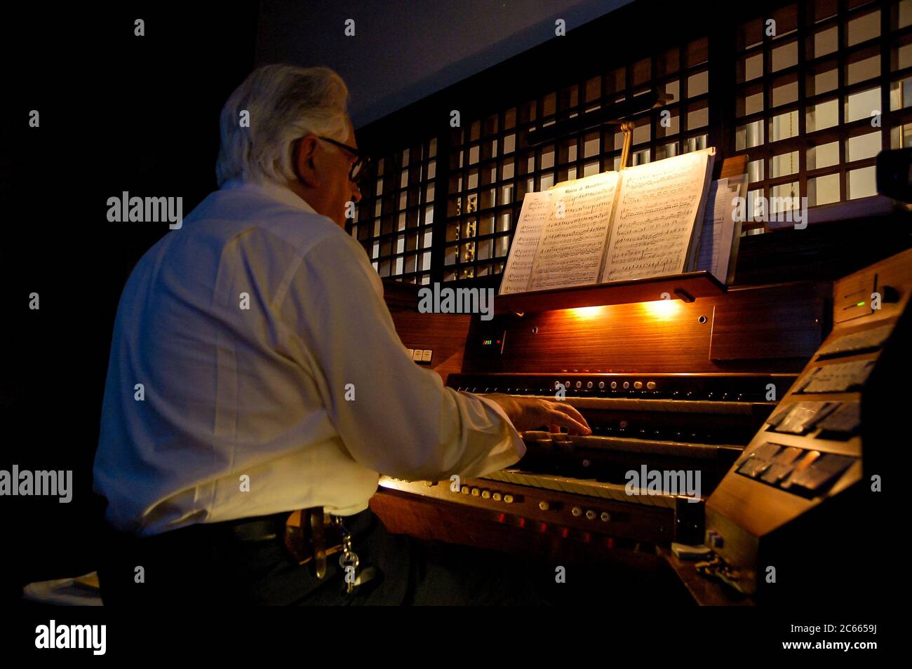 Close up Wiew of a Organist Playing a Organ Stock Photo - Alamy