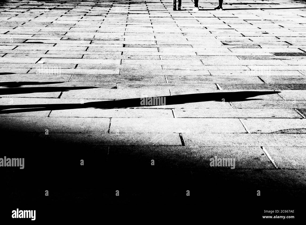 Shadows on a footpath Black and White Stock Photos & Images - Alamy