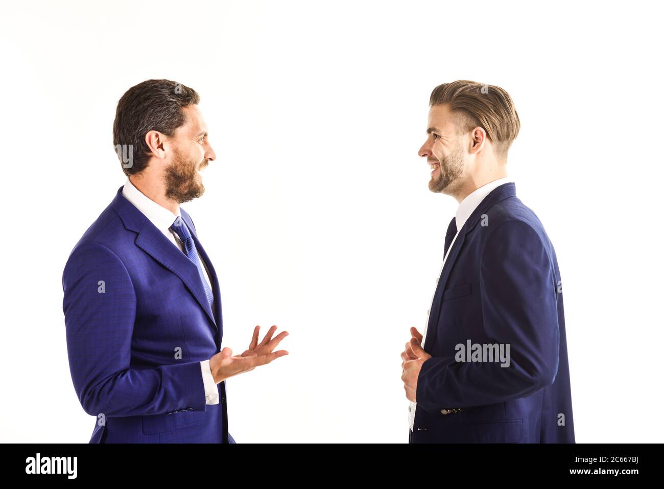 Businessmen with smiling faces and hands expression discussing problems ...