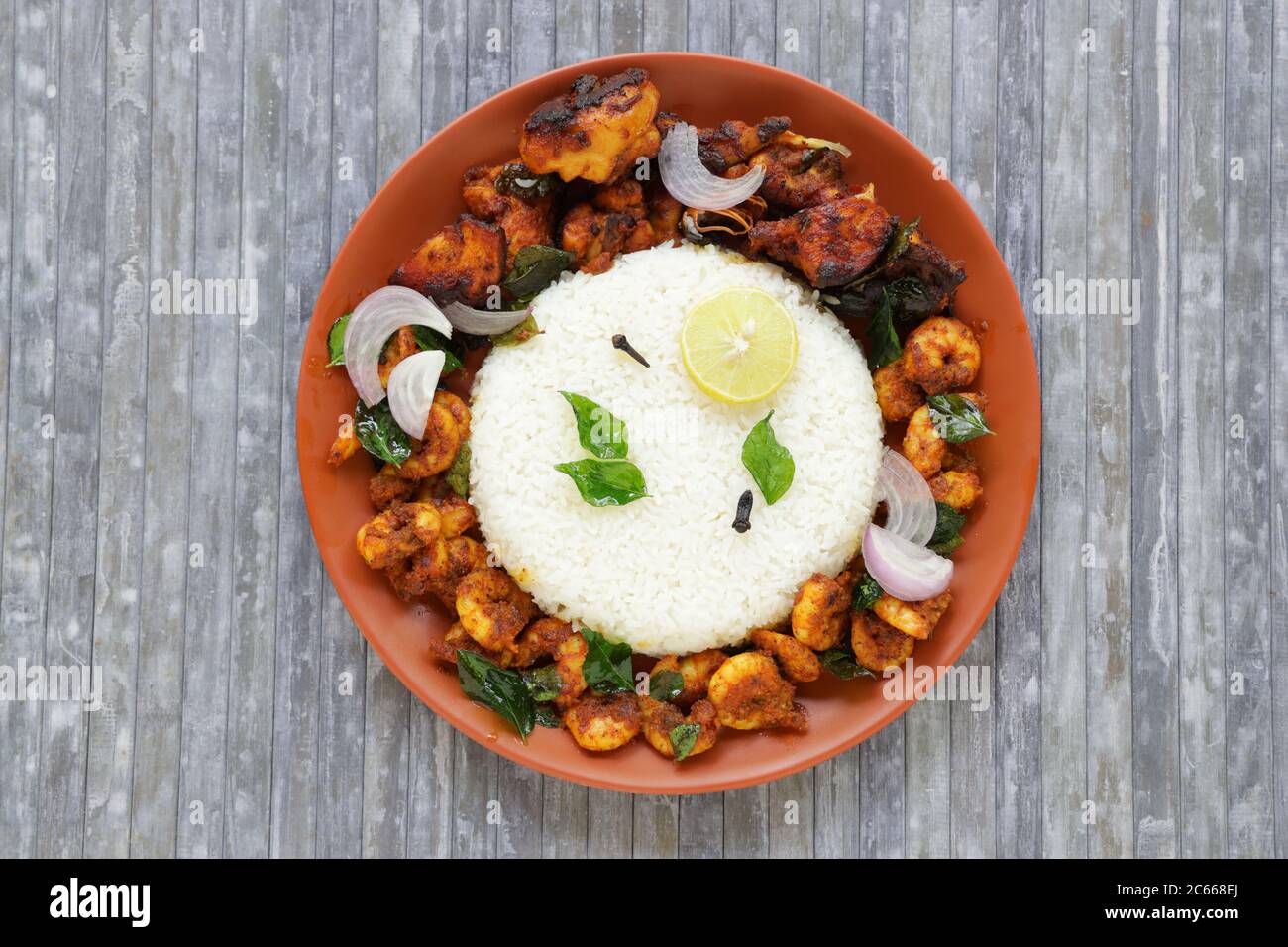 Biryani rice or Geera rice with chicken fry and prawns fry as side dish ...