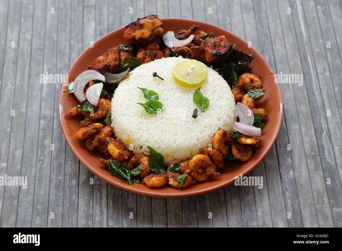 Biryani rice or Geera rice with chicken fry and prawns fry as side dish ...