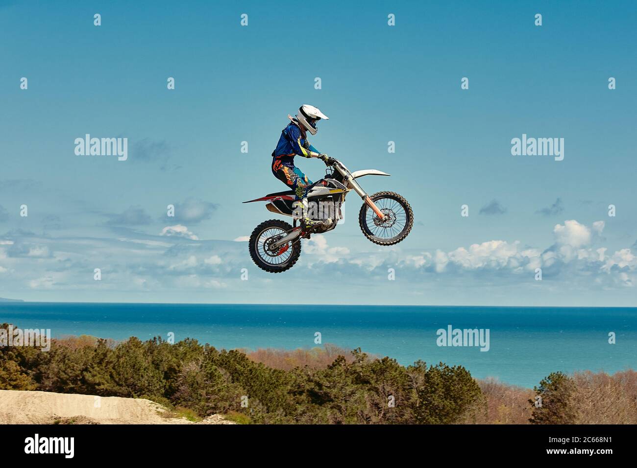 Extreme concept, challenge yourself. Extreme jump on a motorcycle on a ...