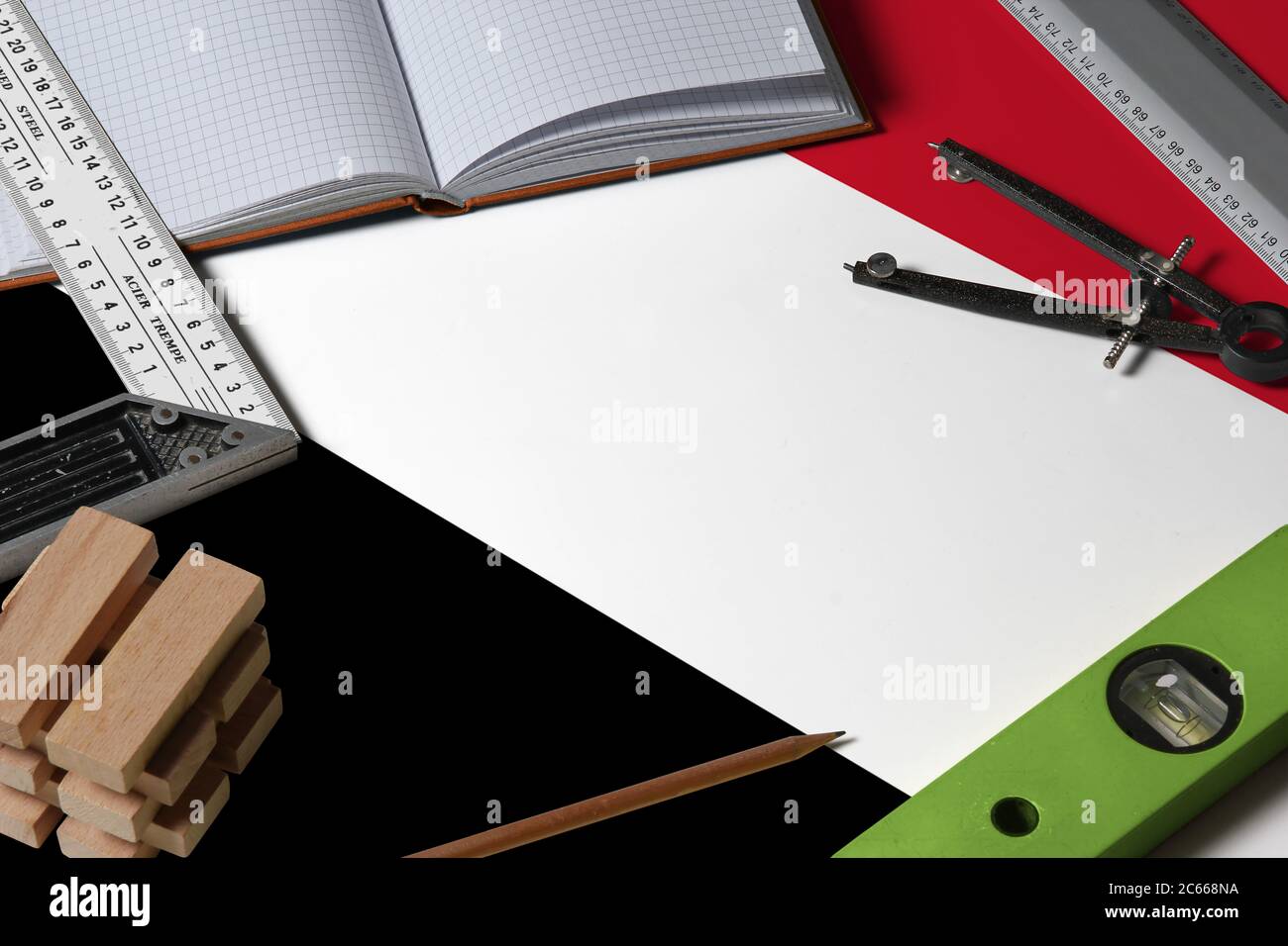 Yemen national flag on profession concept with architect desk and tools ...