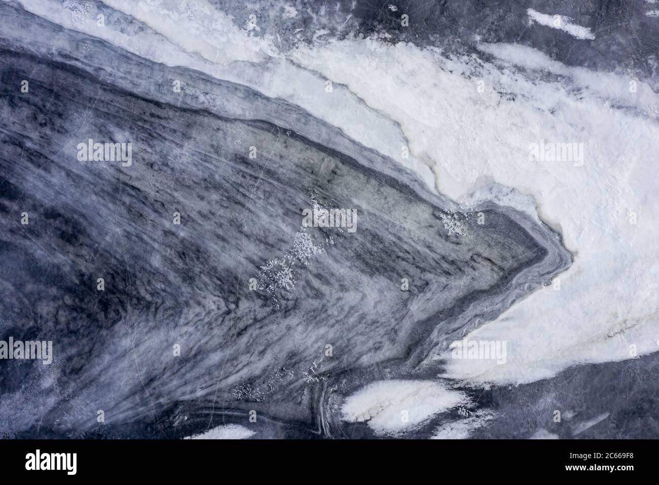 Aerial view of frozen lake. Ice from drone view. Background texture ...